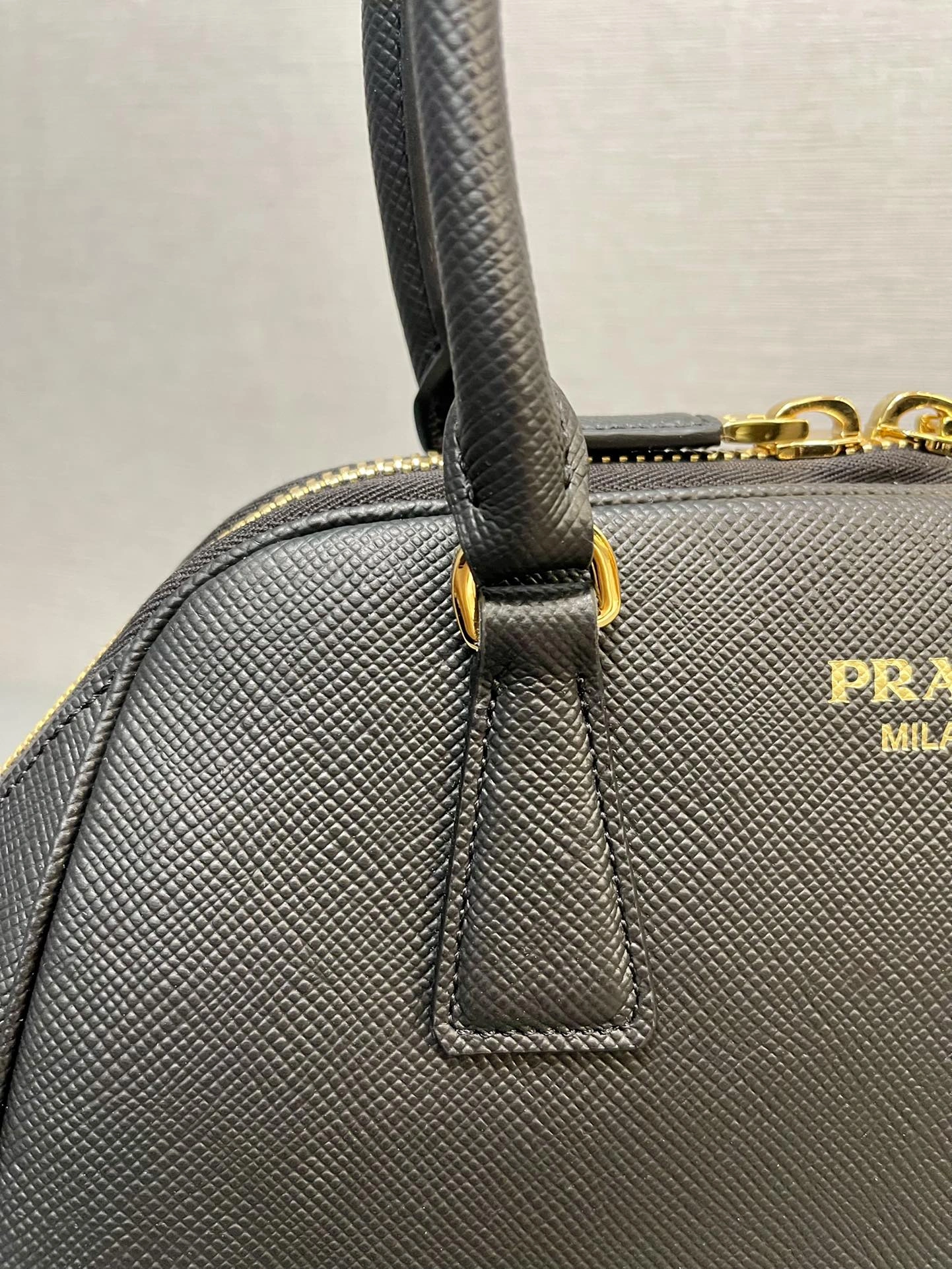 Indistinguishable Prada Top Handle Bags