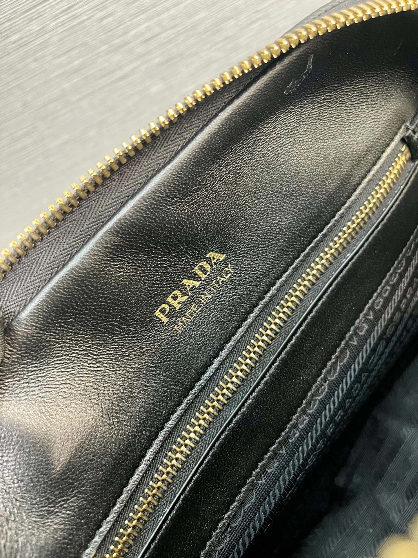Indistinguishable Prada Top Handle Bags