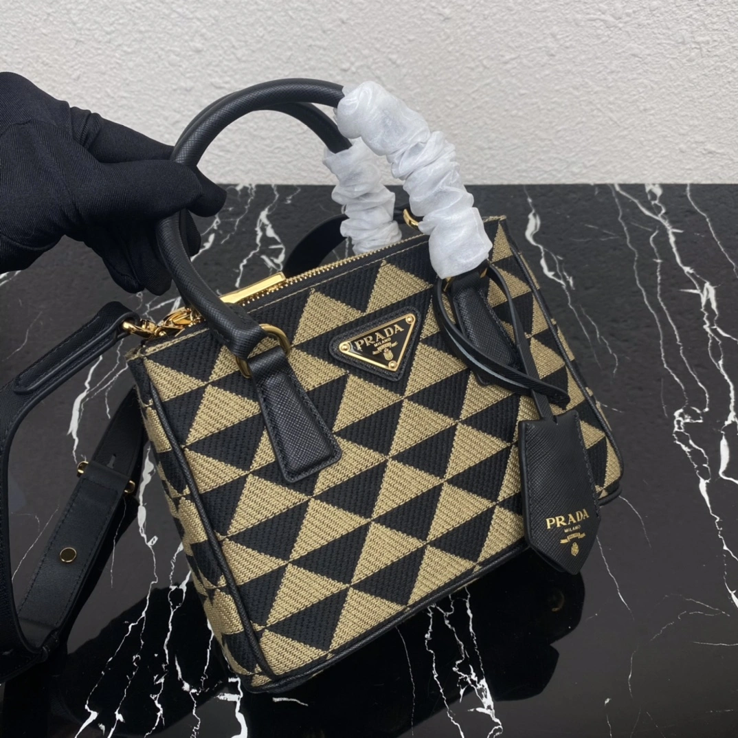 Brand-authenticated Prada Top Handle Bags