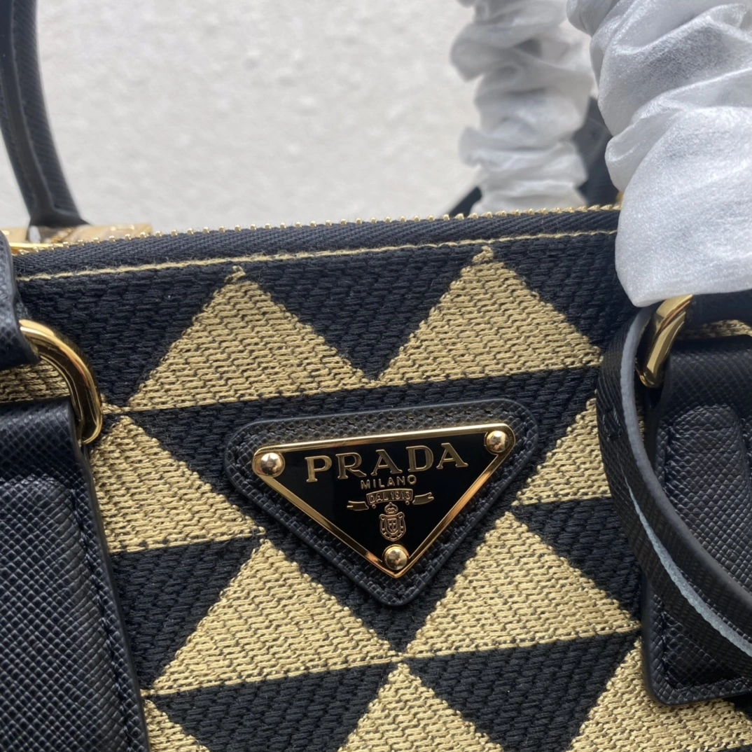 Brand-authenticated Prada Top Handle Bags