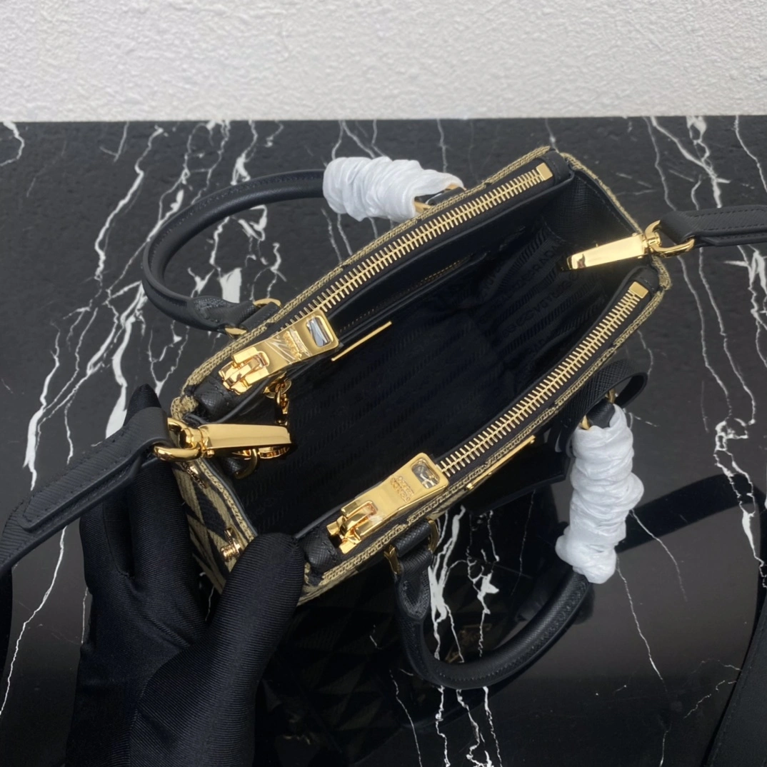 Brand-authenticated Prada Top Handle Bags