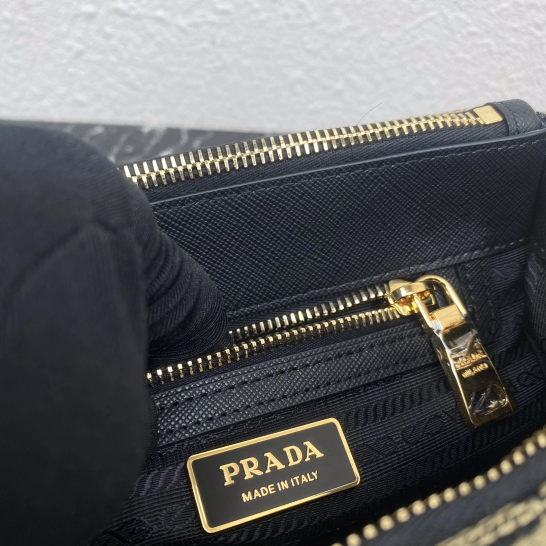 Brand-authenticated Prada Top Handle Bags
