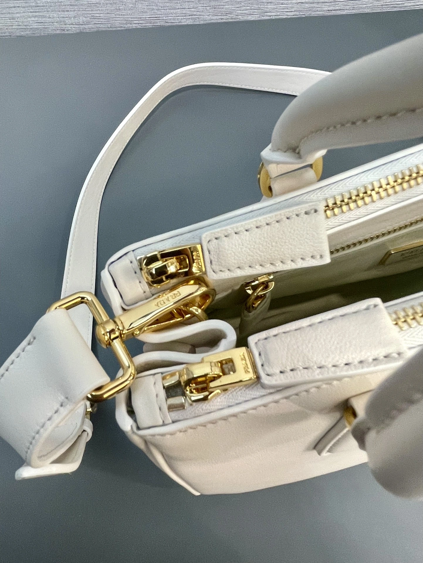 Reasonably priced Prada Top Handle Bags