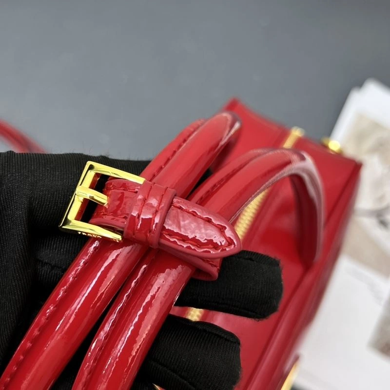 Brand-authenticated Prada Top Handle Bags