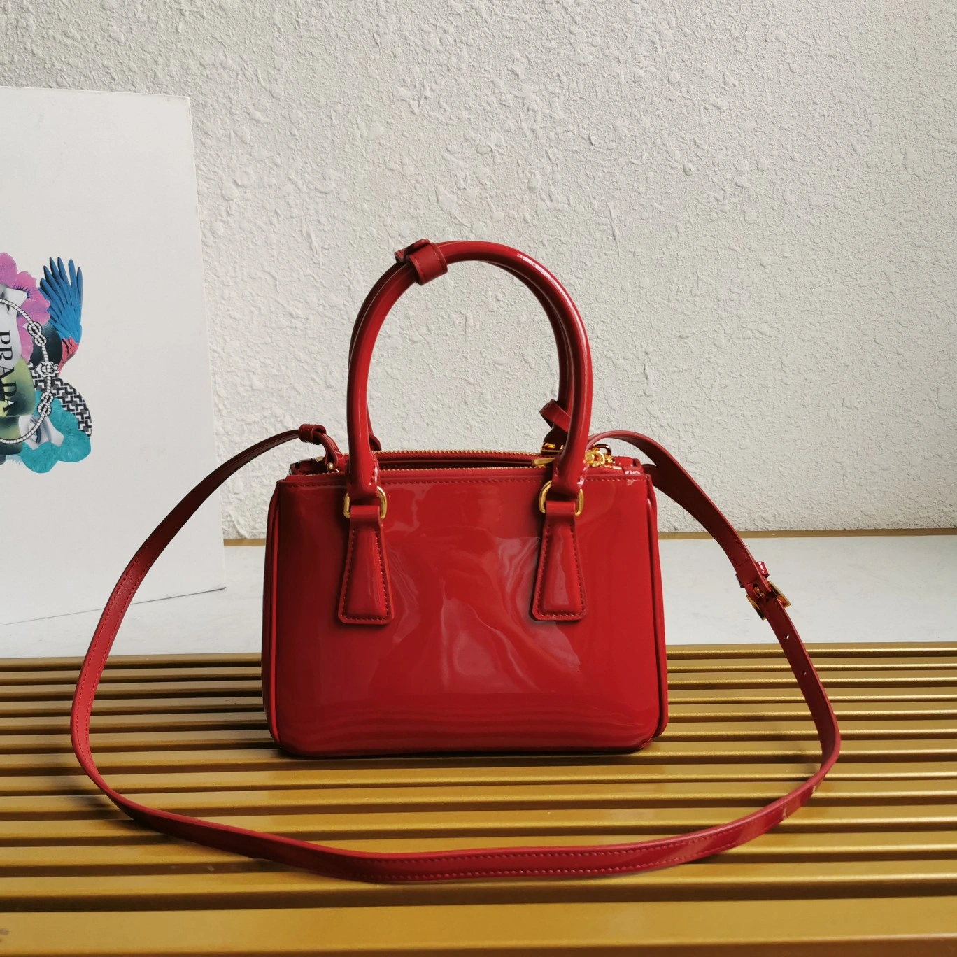 Brand-authenticated Prada Top Handle Bags