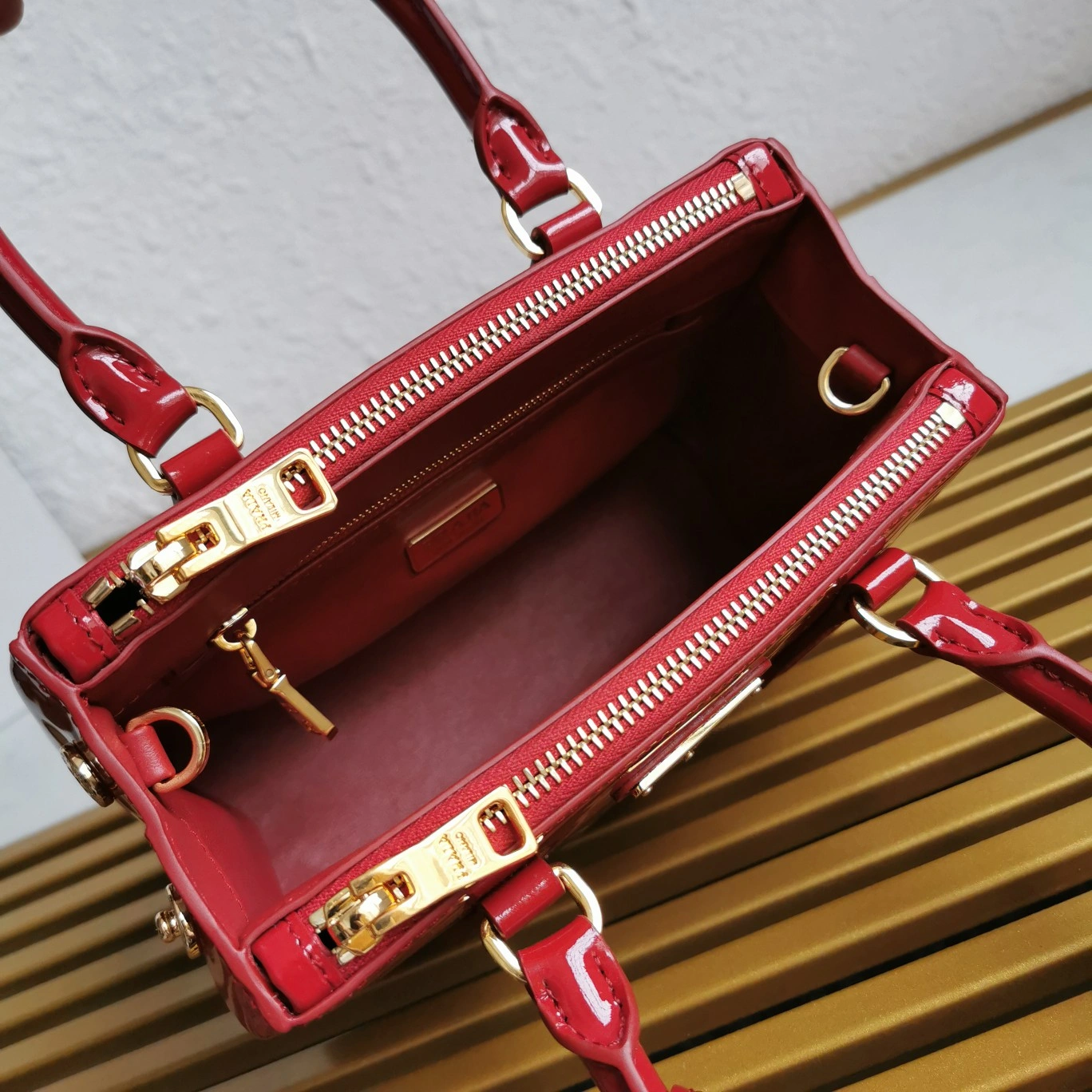Brand-authenticated Prada Top Handle Bags