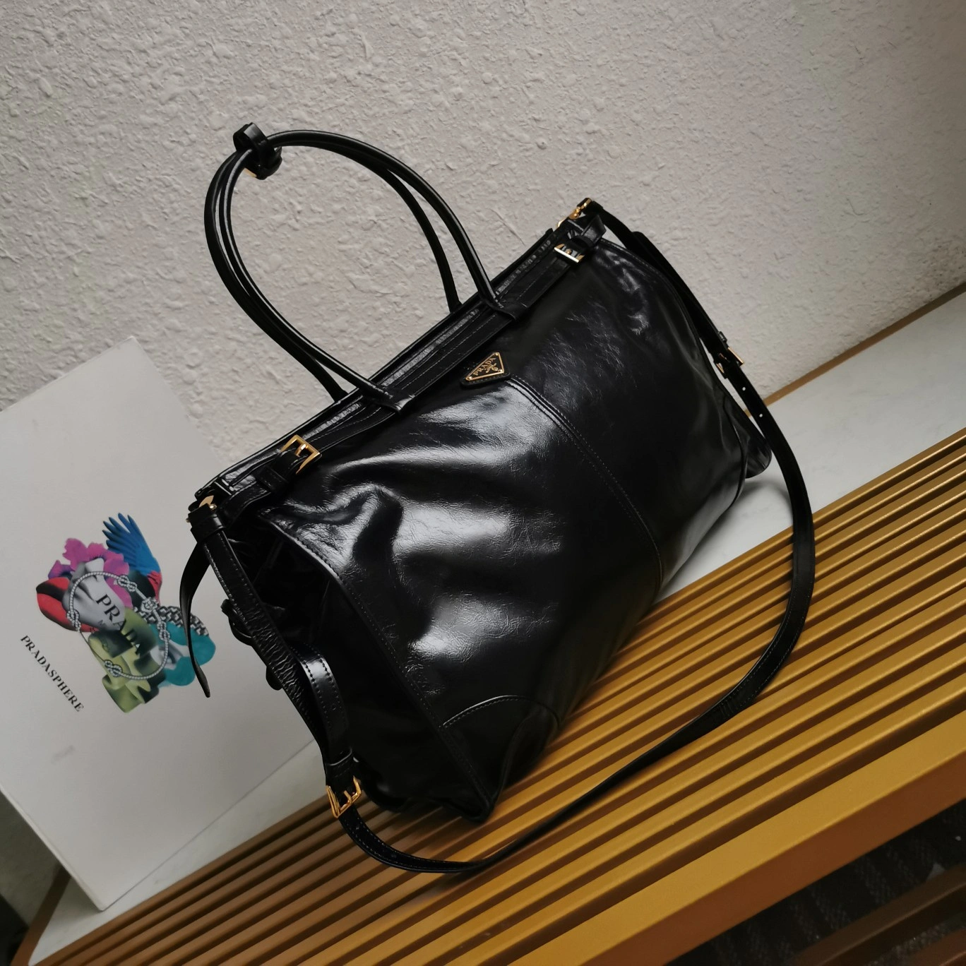 Brand-authenticated Prada Top Handle Bags