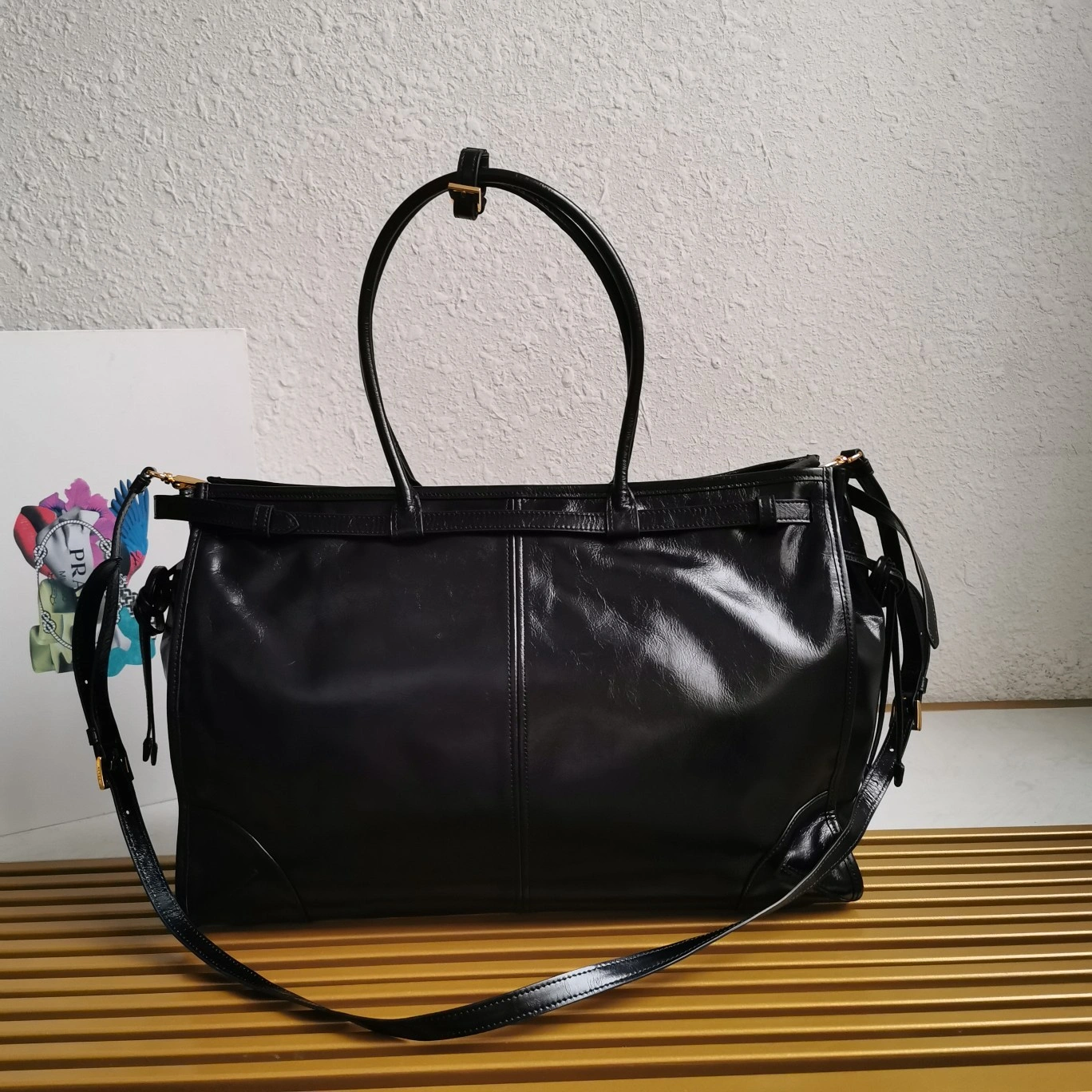Brand-authenticated Prada Top Handle Bags