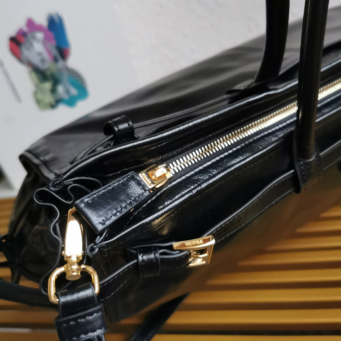 Brand-authenticated Prada Top Handle Bags