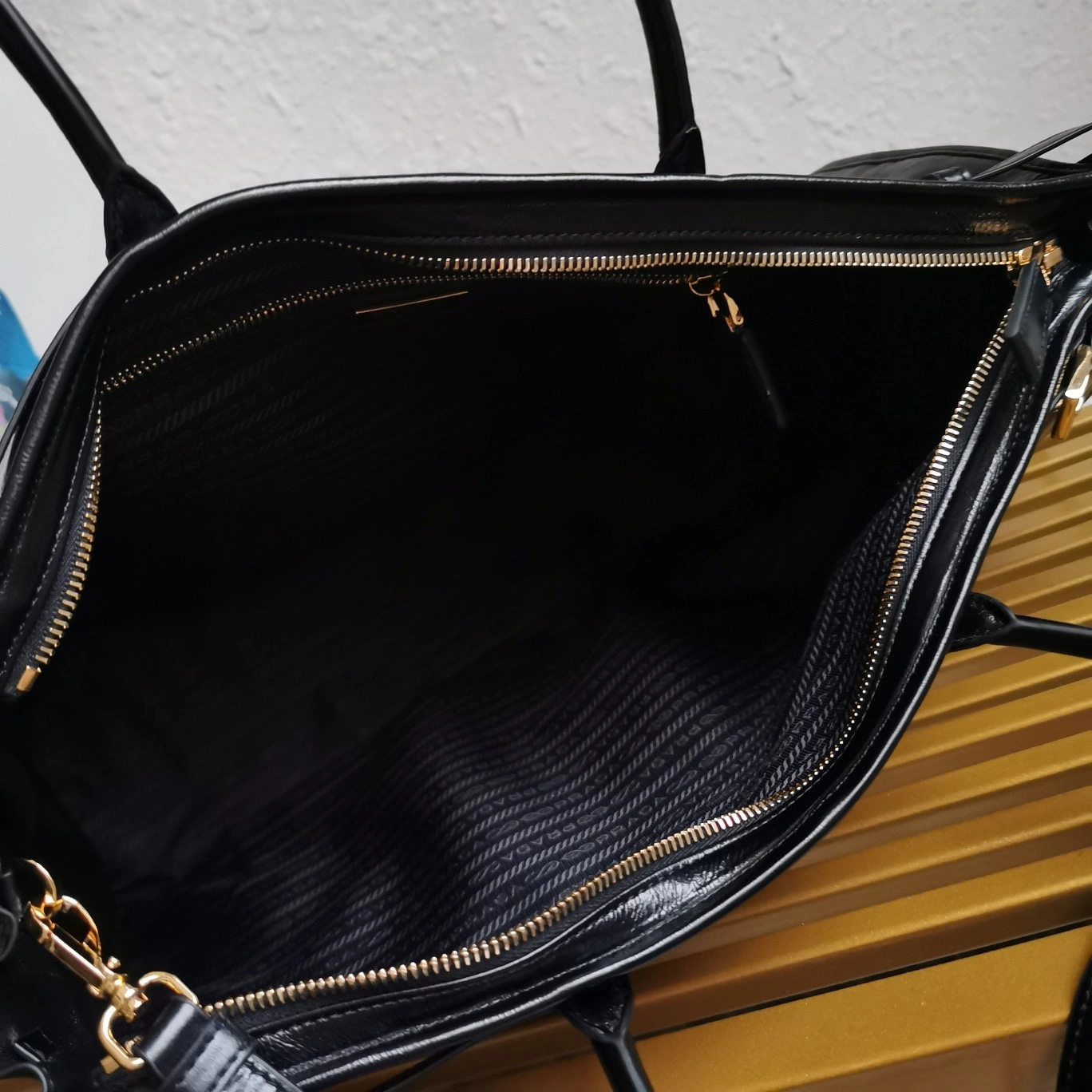 Brand-authenticated Prada Top Handle Bags