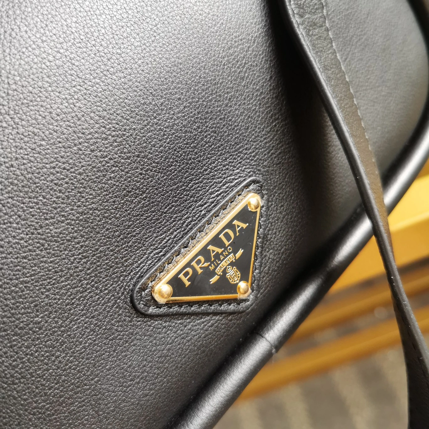 Value-priced Prada Top Handle Bags