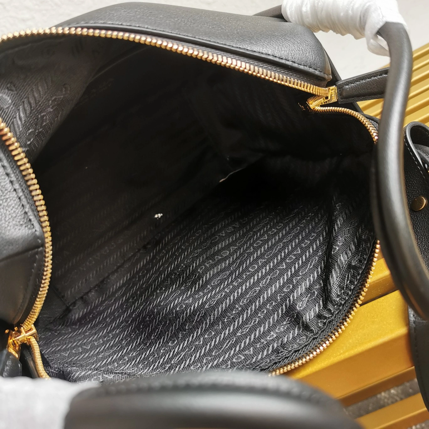 Value-priced Prada Top Handle Bags