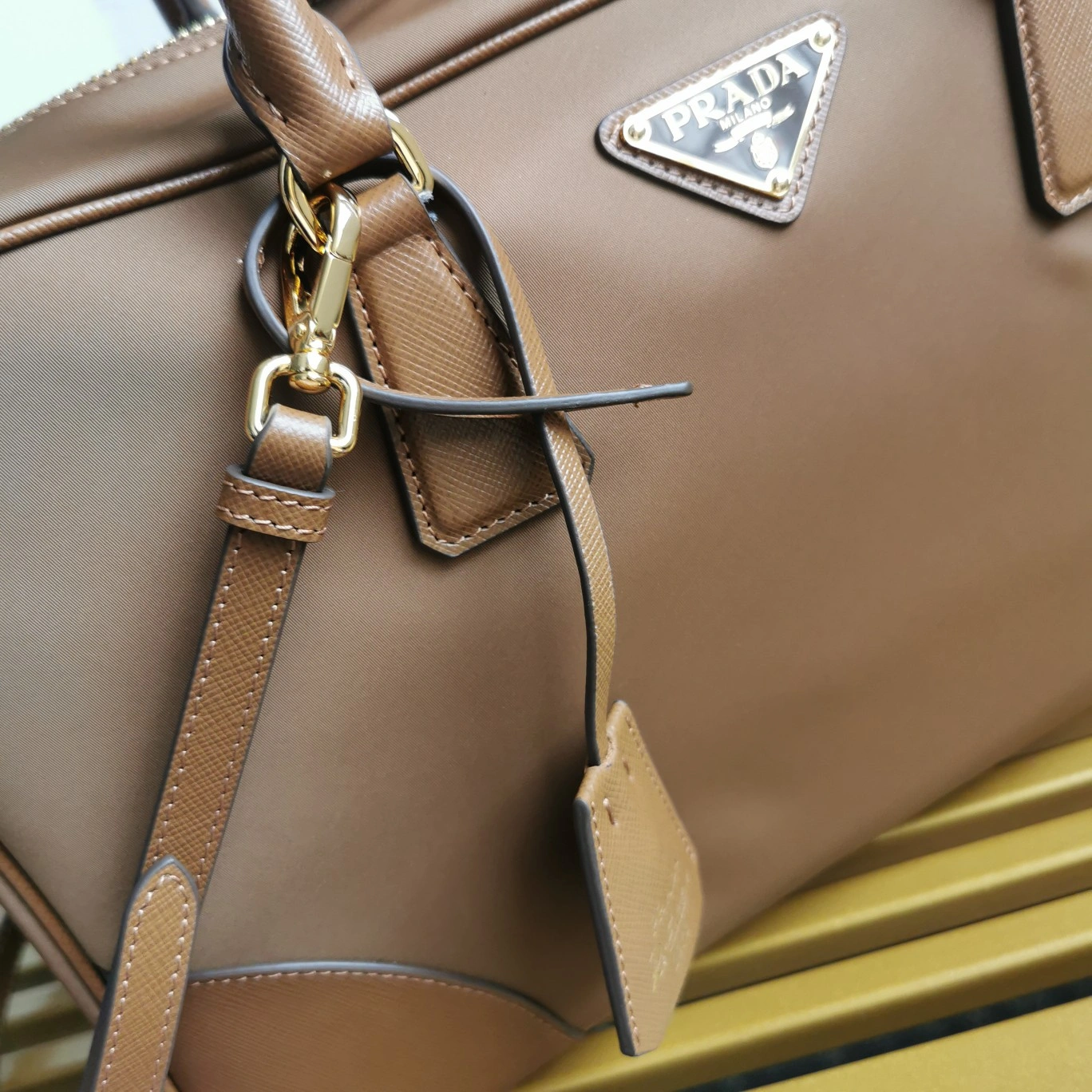 Budget-friendly Prada Top Handle Bags