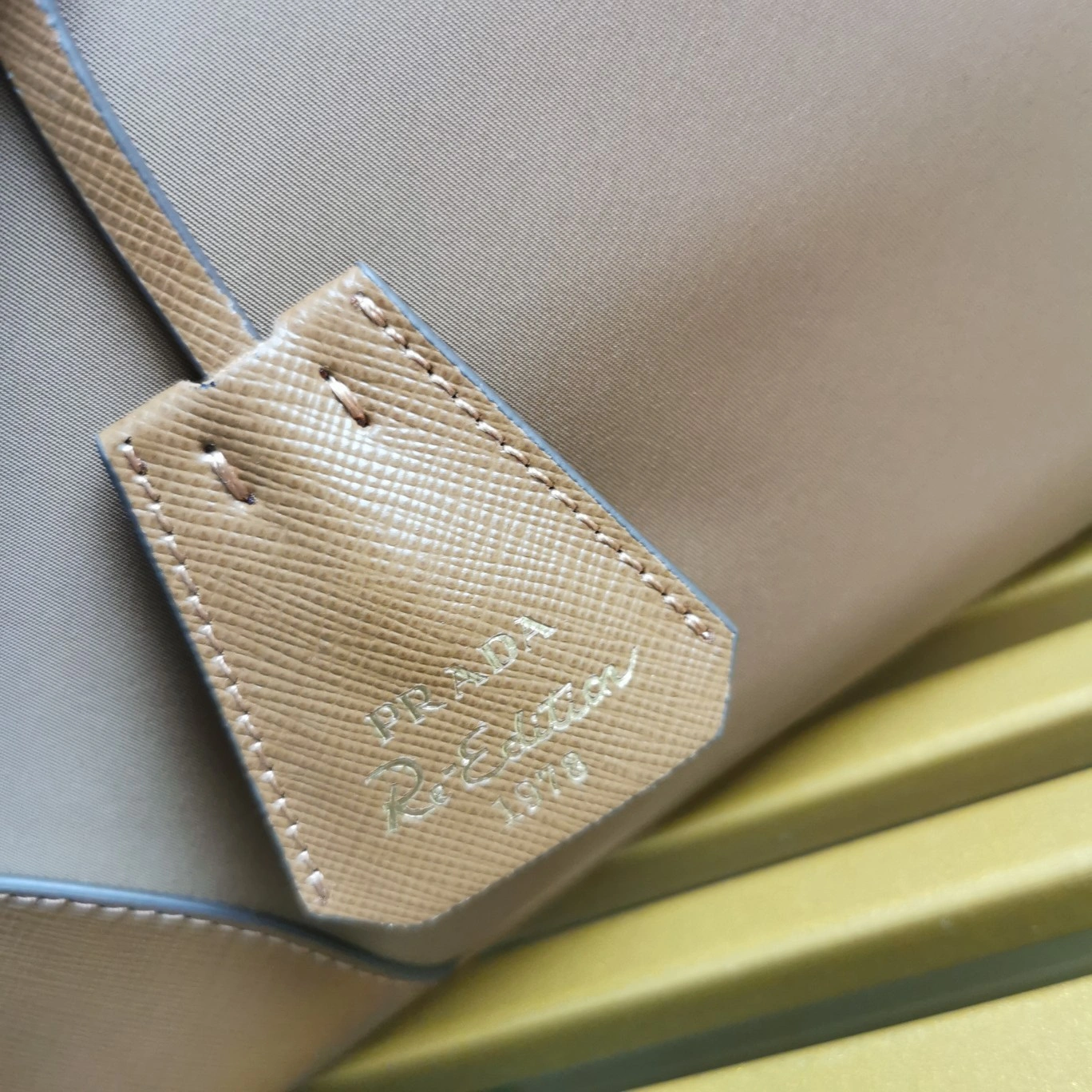 Budget-friendly Prada Top Handle Bags
