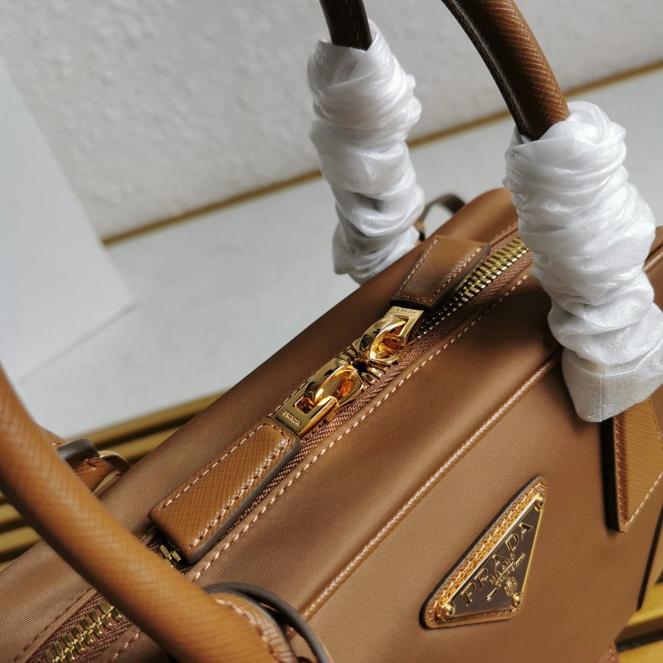 Budget-friendly Prada Top Handle Bags