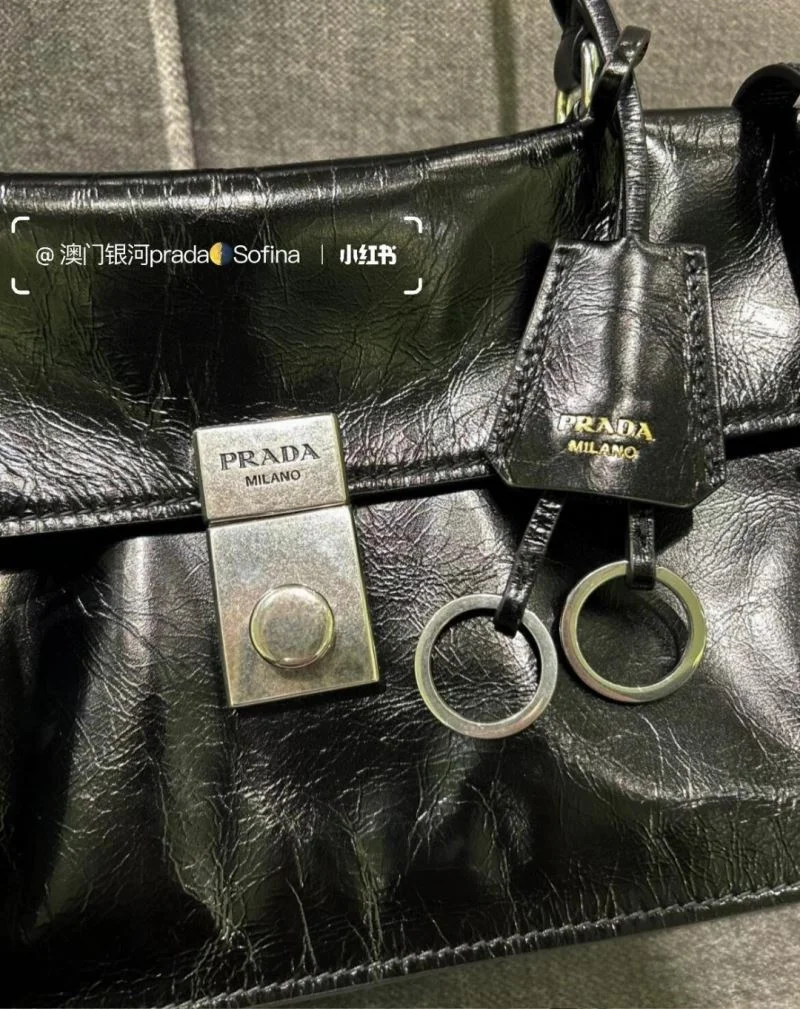 Reasonably priced Prada Top Handle Bags