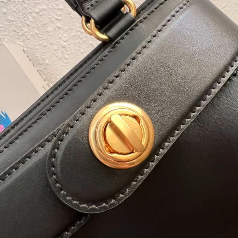 Value-priced Prada Top Handle Bags