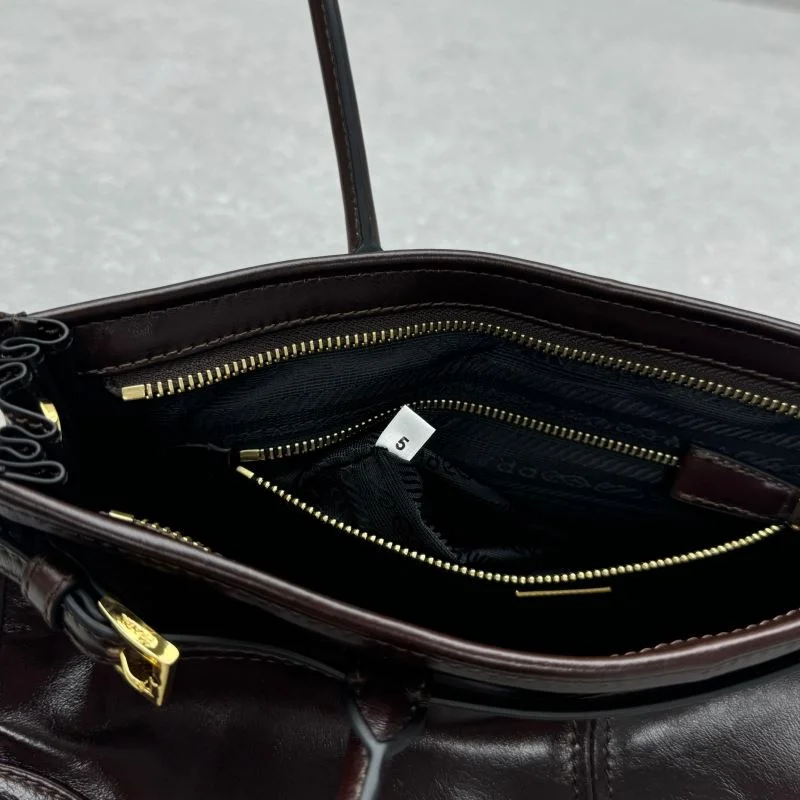 Value-priced Prada Top Handle Bags
