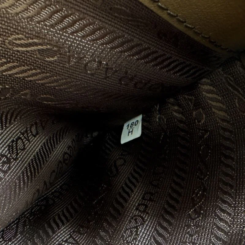 Brand-authenticated Prada Top Handle Bags