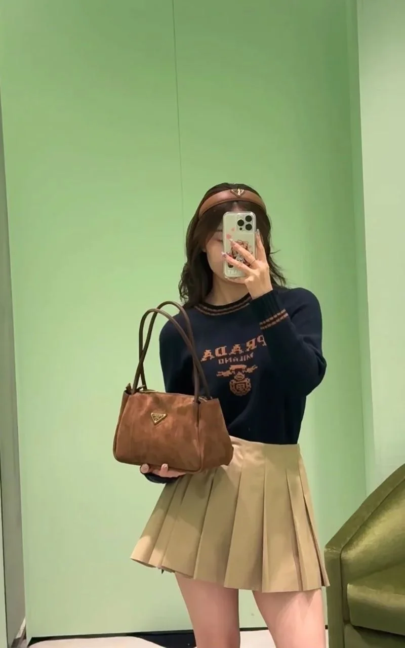Brand-authenticated Prada Top Handle Bags