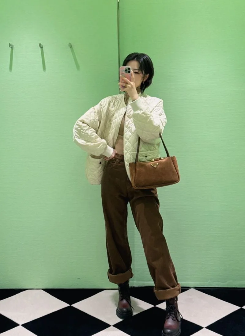Brand-authenticated Prada Top Handle Bags