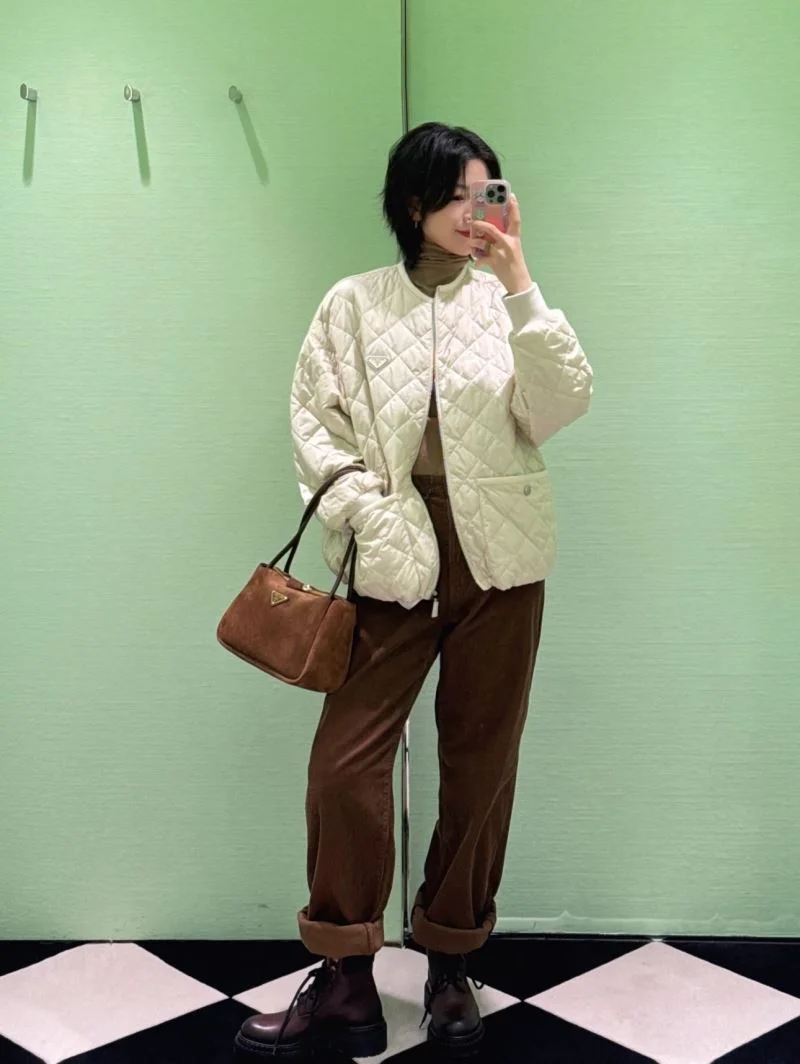 Brand-authenticated Prada Top Handle Bags
