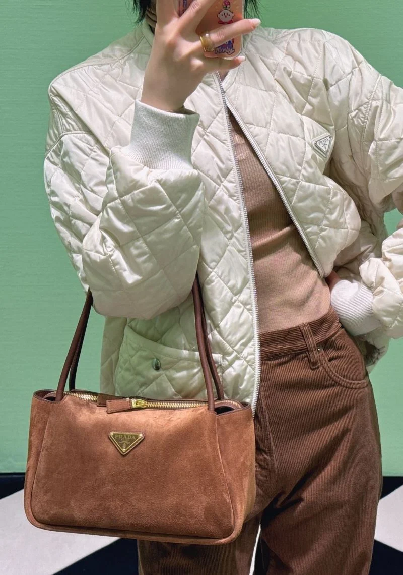 Brand-authenticated Prada Top Handle Bags