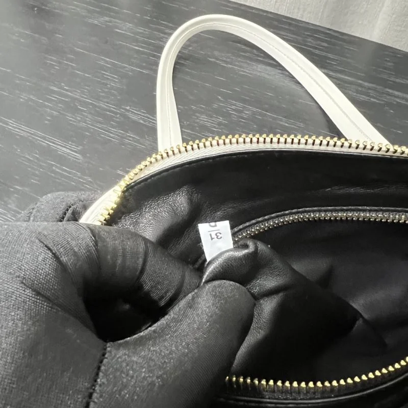 Indistinguishable Prada Top Handle Bags