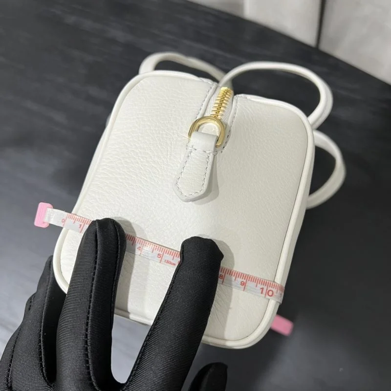 Indistinguishable Prada Top Handle Bags