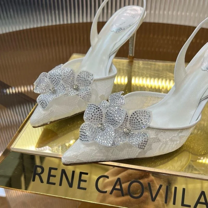 Accurate model Rene Caovilla Sandals