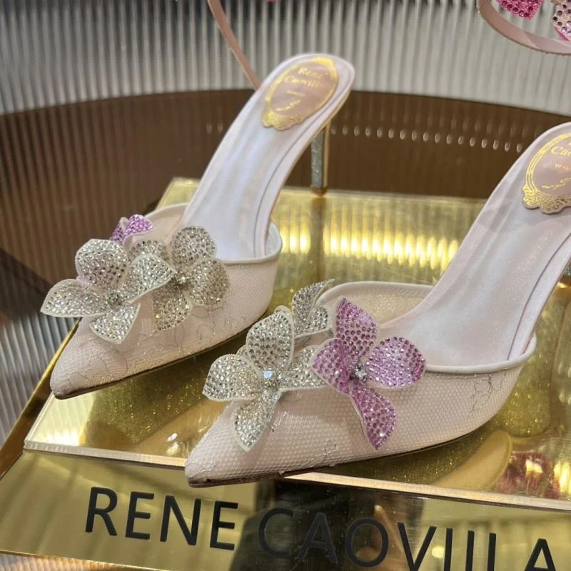Accurate model Rene Caovilla Sandals