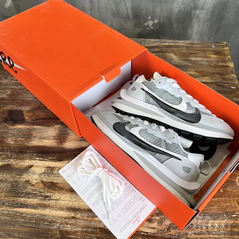Cut-rate Sacai x Nike VaporWaffle Shoes