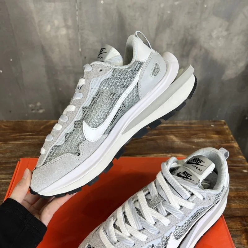 Cut-rate Sacai x Nike VaporWaffle Shoes