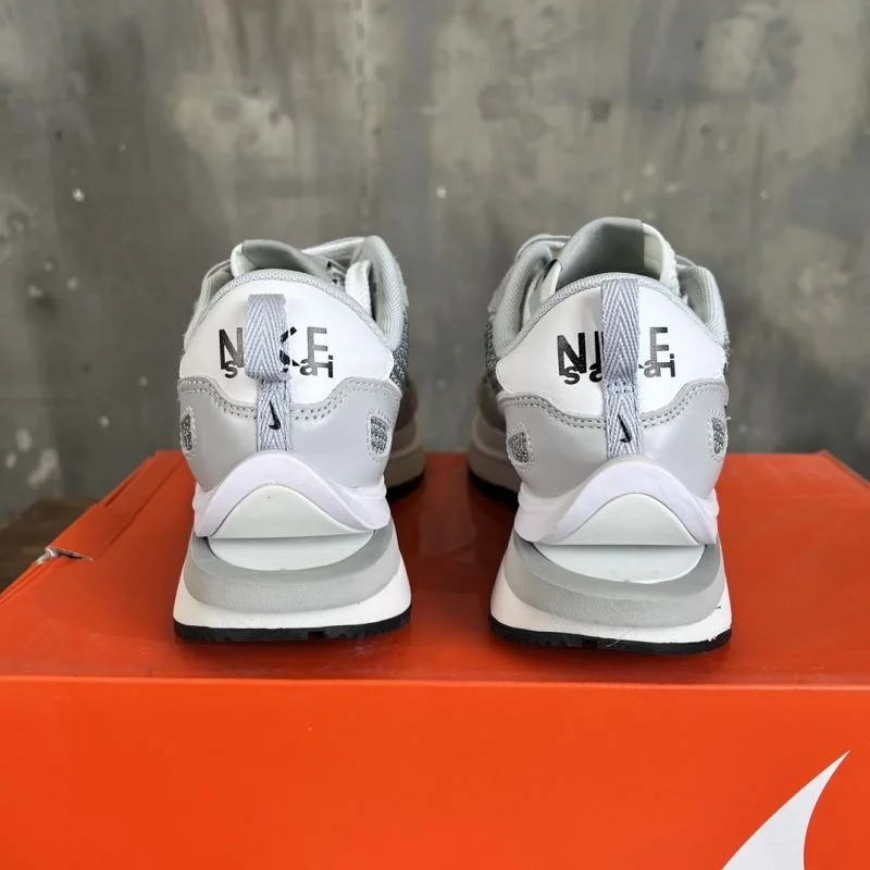 Cut-rate Sacai x Nike VaporWaffle Shoes
