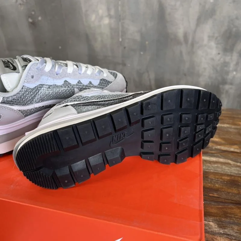 Cut-rate Sacai x Nike VaporWaffle Shoes