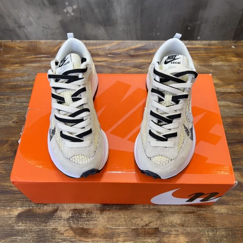 Brand-authenticated Sacai x Nike VaporWaffle Shoes