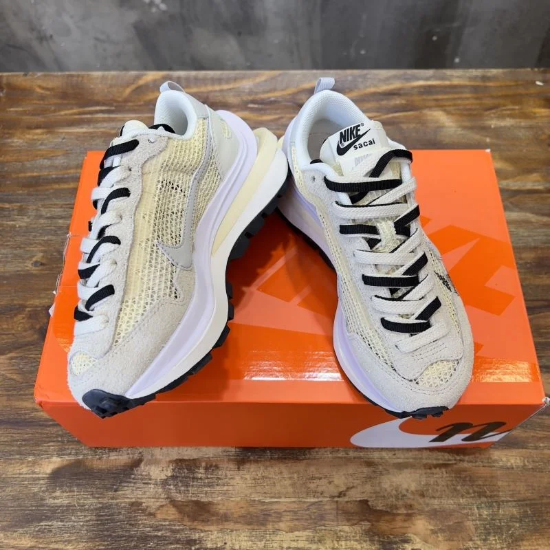 Brand-authenticated Sacai x Nike VaporWaffle Shoes