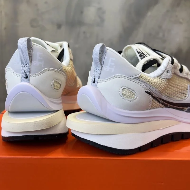 Brand-authenticated Sacai x Nike VaporWaffle Shoes