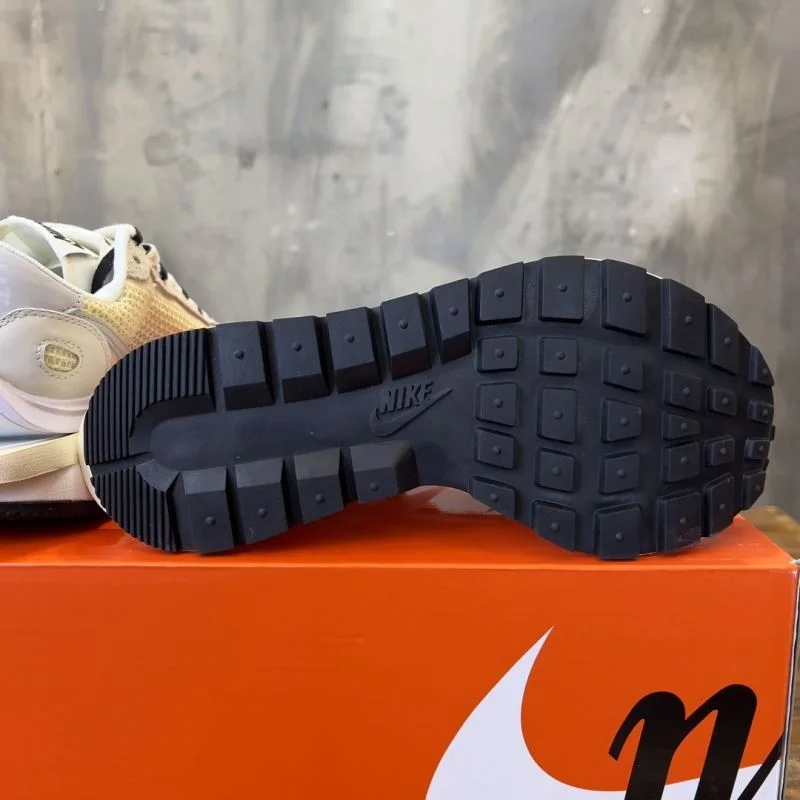 Brand-authenticated Sacai x Nike VaporWaffle Shoes