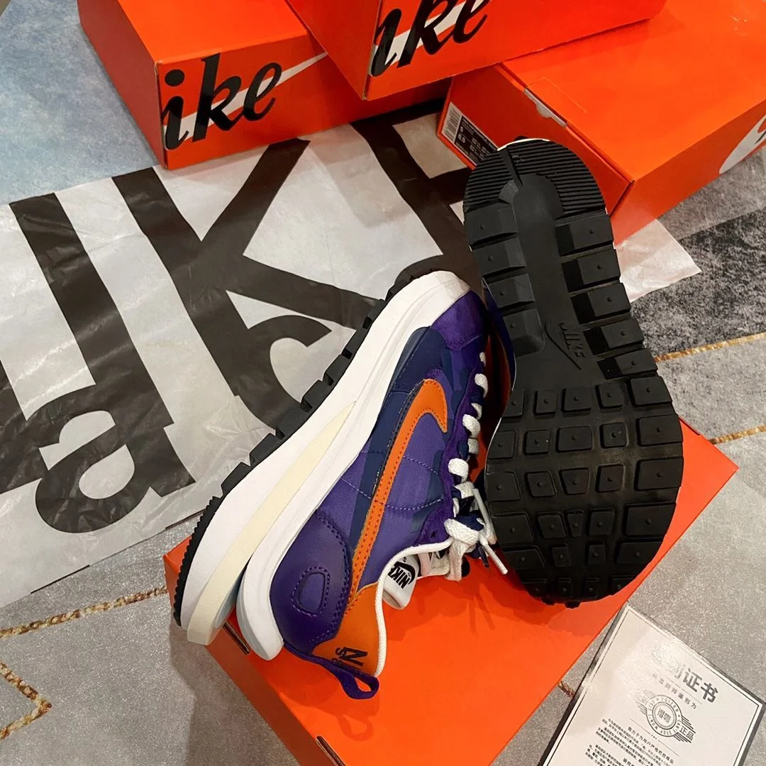 Value-priced Sacai x Nike VaporWaffle Shoes