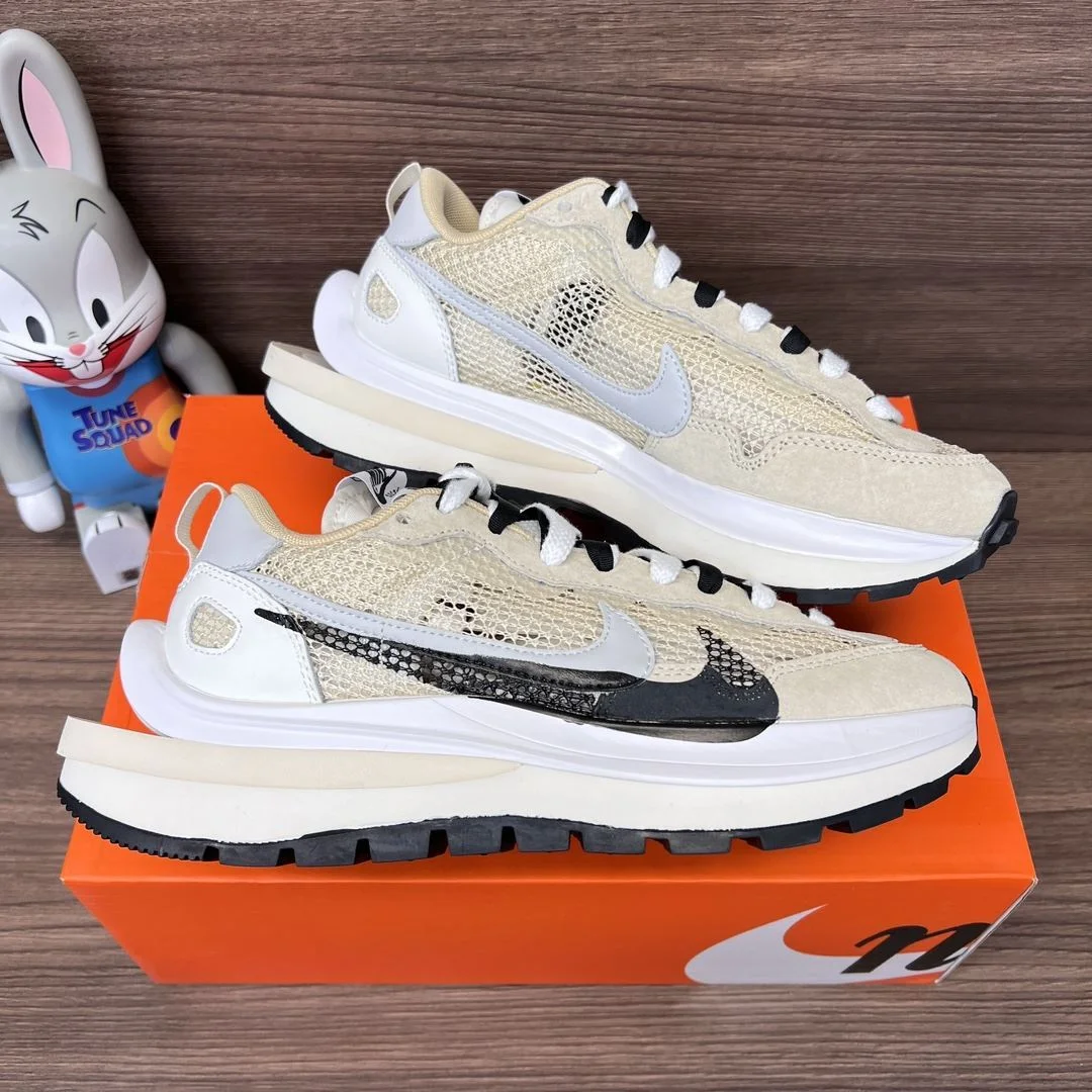 Brand-authenticated Sacai x Nike VaporWaffle Shoes