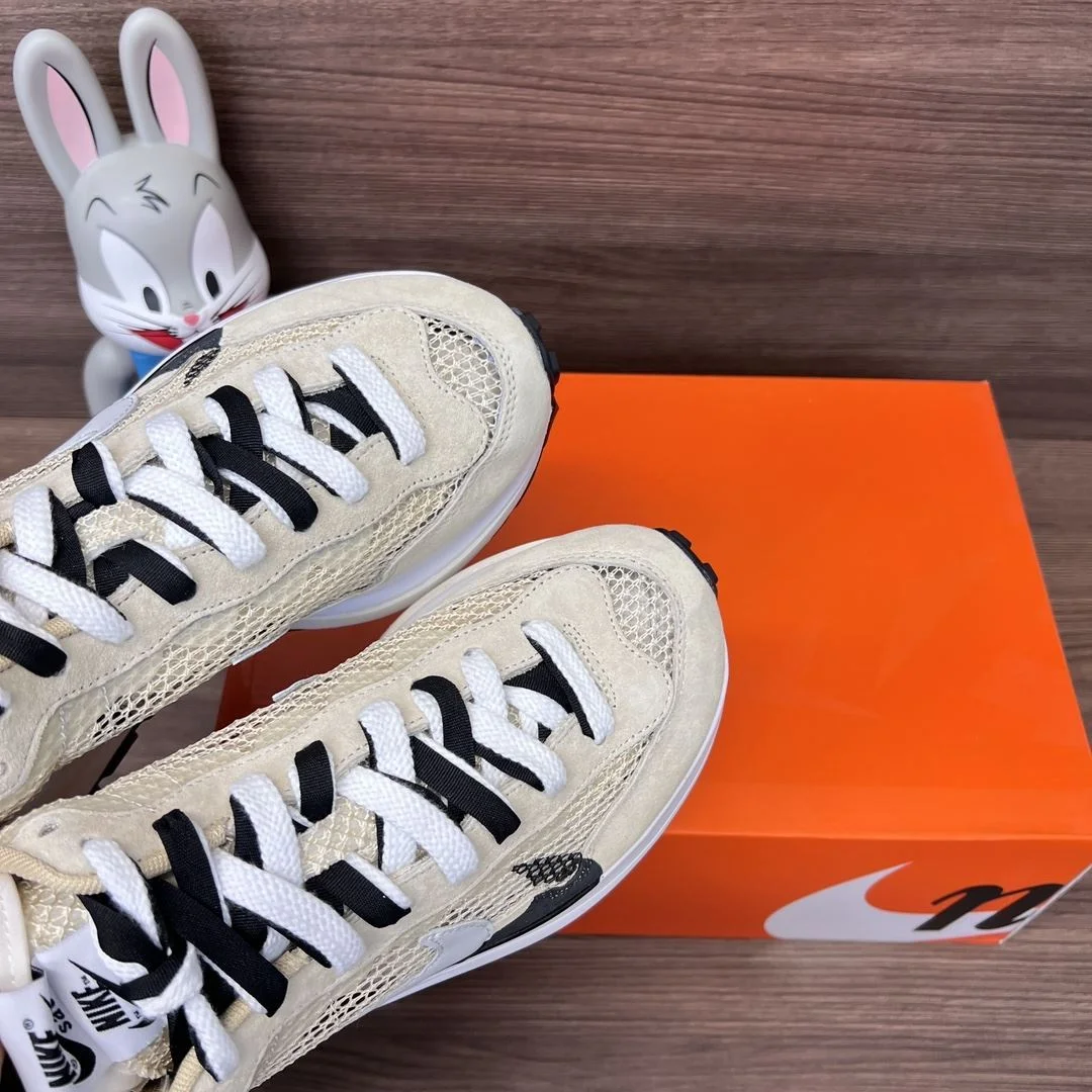 Brand-authenticated Sacai x Nike VaporWaffle Shoes