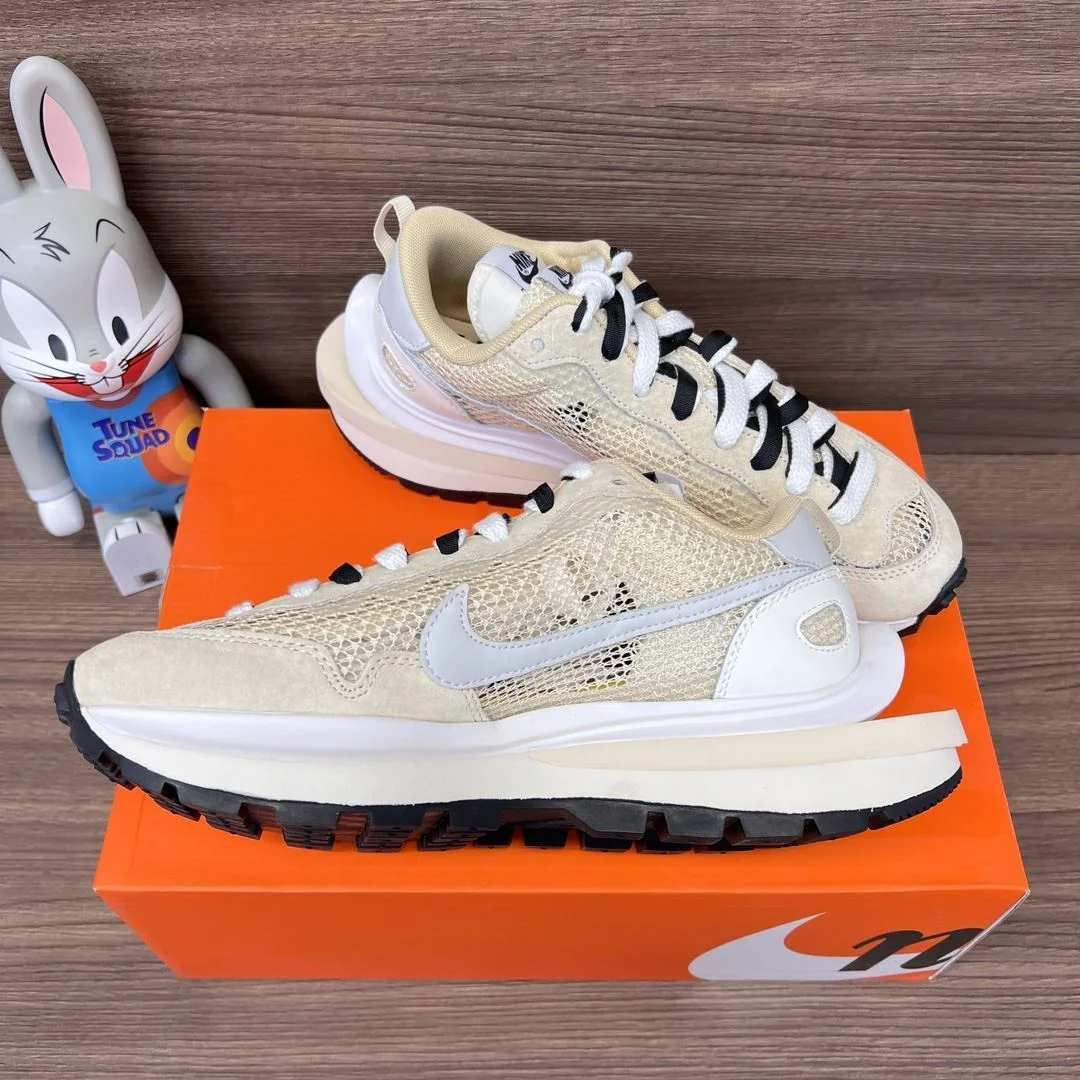 Brand-authenticated Sacai x Nike VaporWaffle Shoes