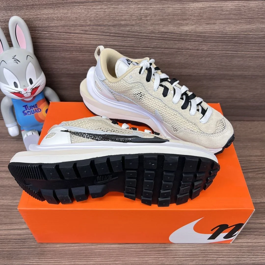 Brand-authenticated Sacai x Nike VaporWaffle Shoes