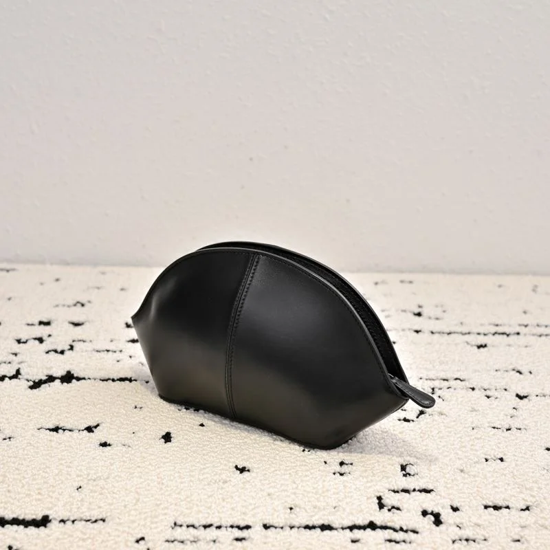 The Row Clutch Bags