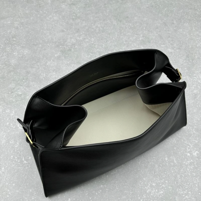Accurate model The Row Clutch Bags