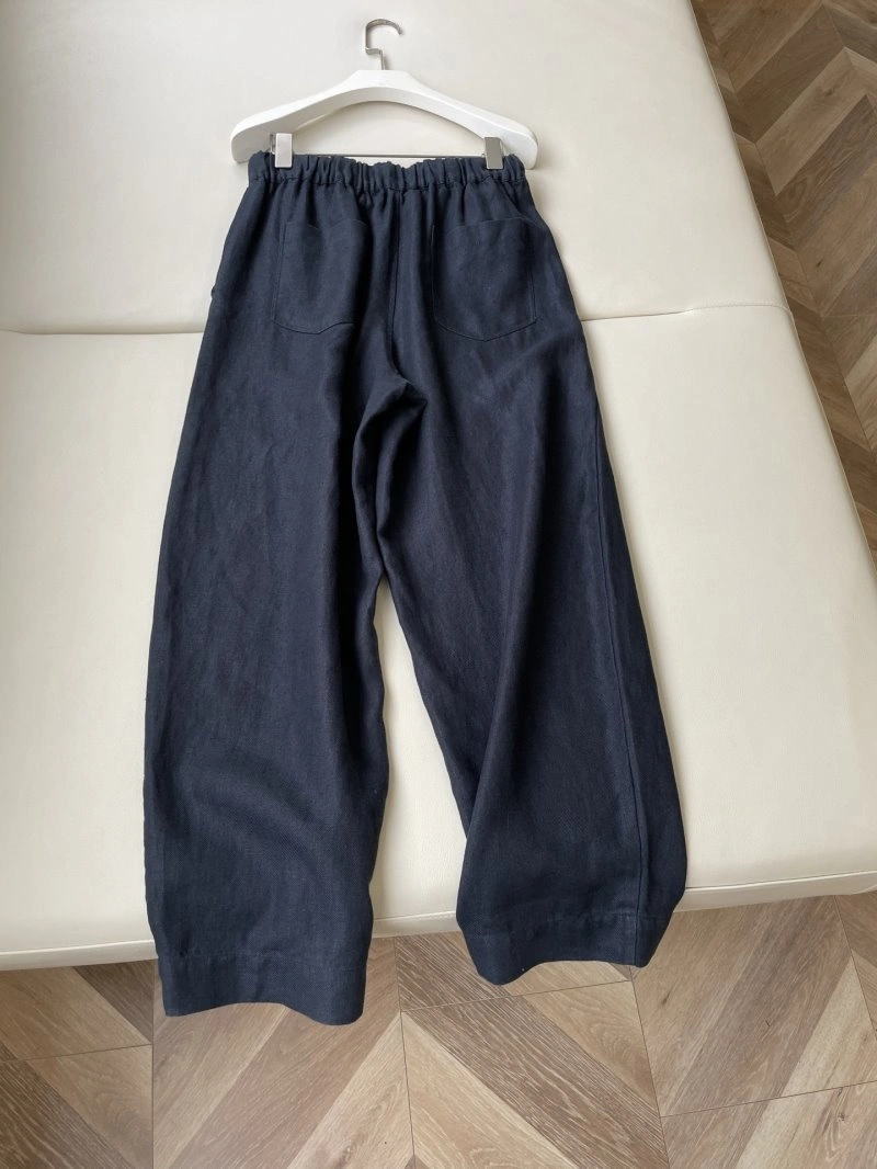Top match The Row Long Pants