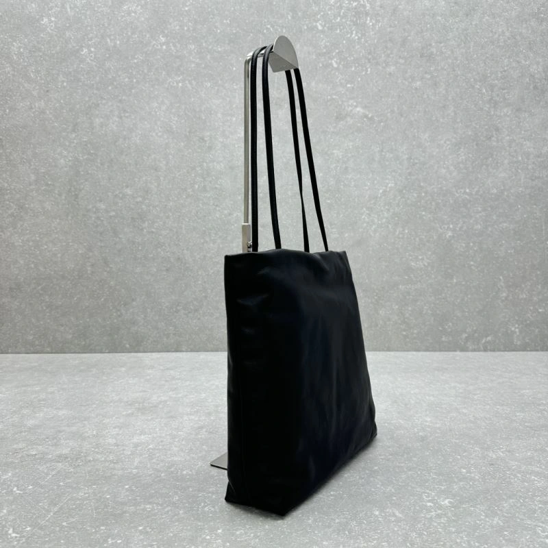 Accurate model The Row Shopping Bags