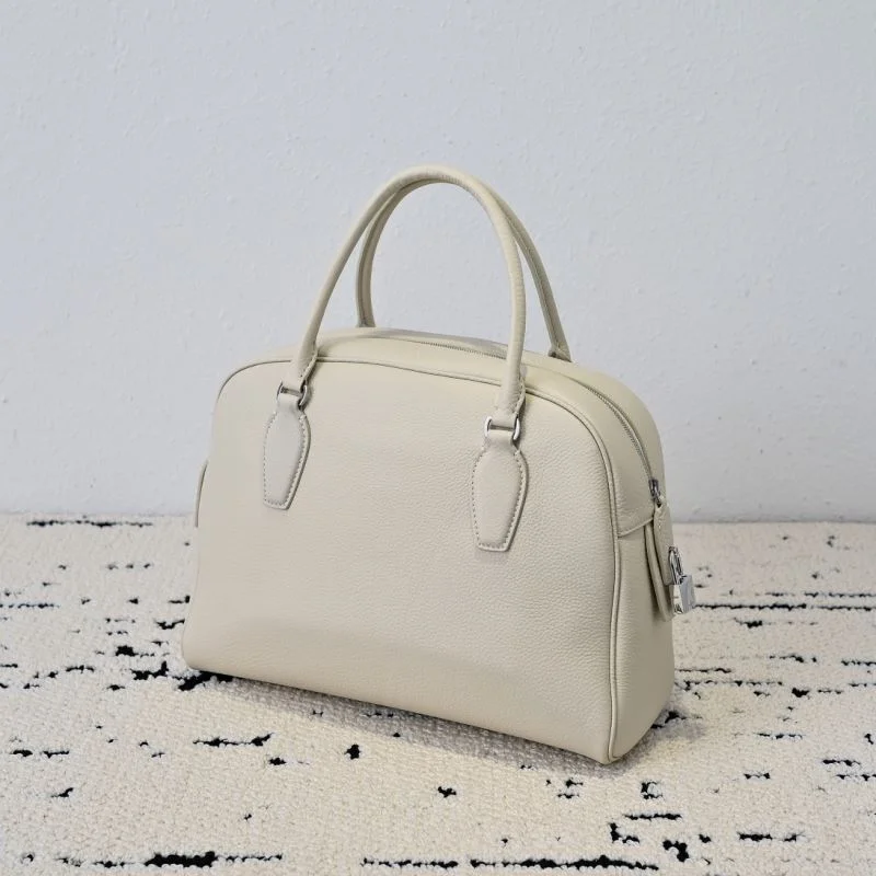 Top match The Row Top Handle Bags