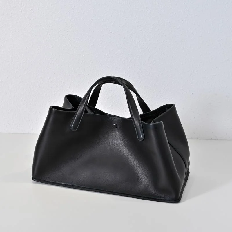 Top match The Row Top Handle Bags